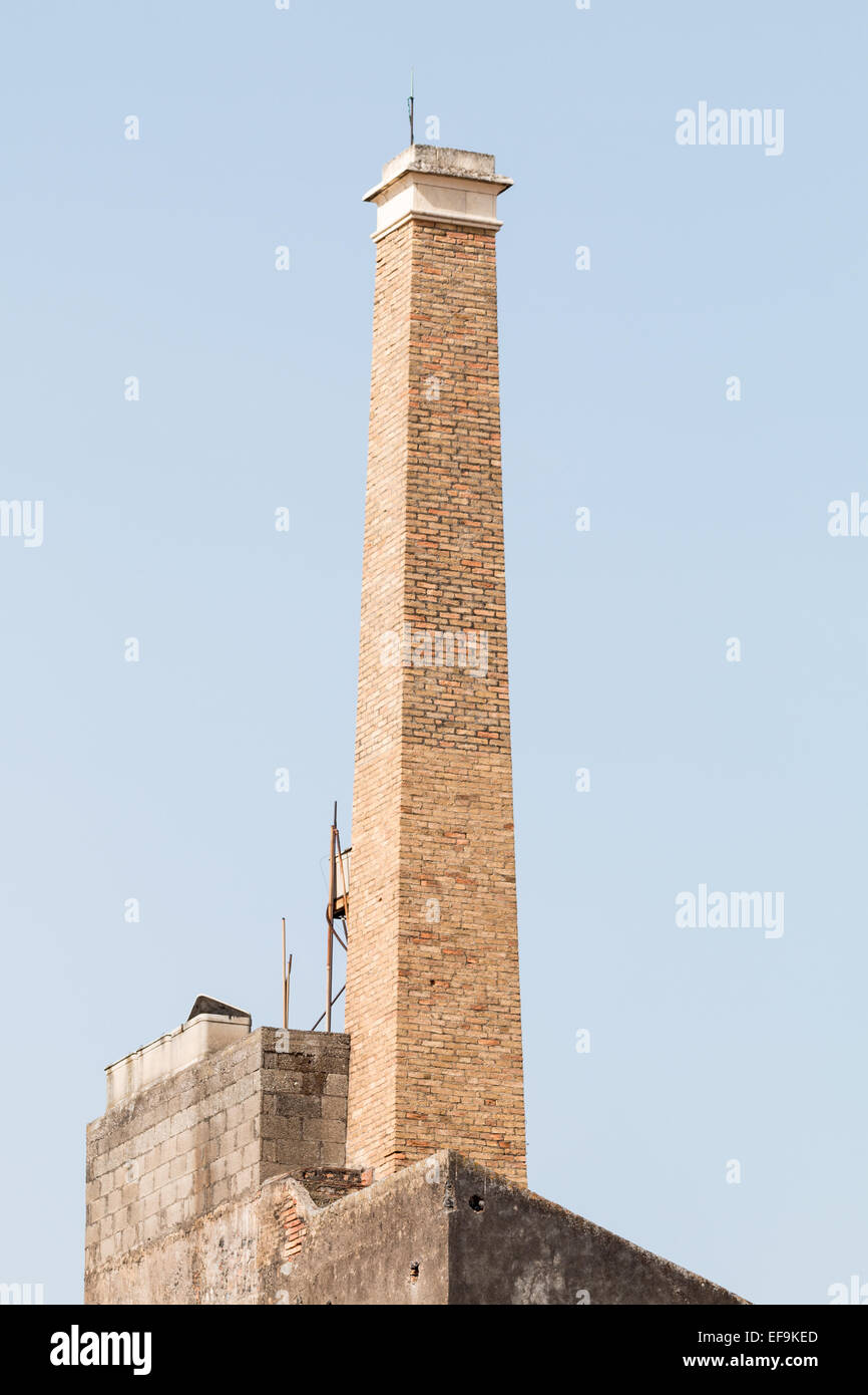 Old tower of the ancient distillery in Sicily Stock Photo - Alamy