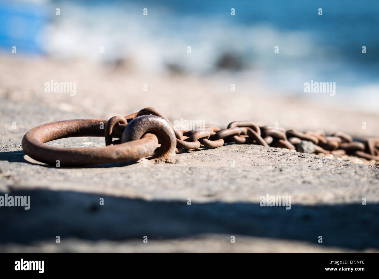 Rusty chains for small fishing boats in Riposto Stock Photo - Alamy