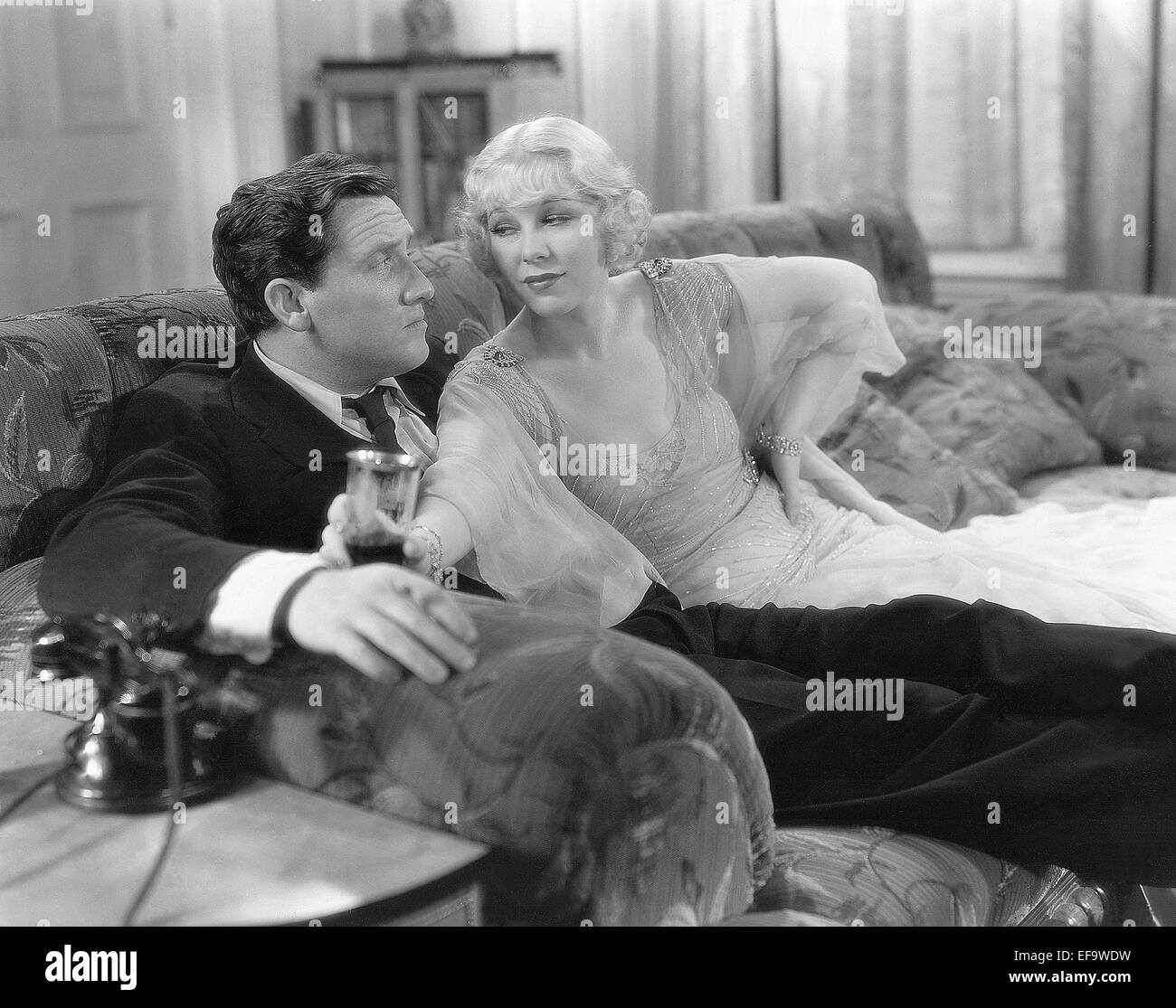 SPENCER TRACY, GLENDA FARRELL, MAN'S CASTLE, 1933 Stock Photo - Alamy