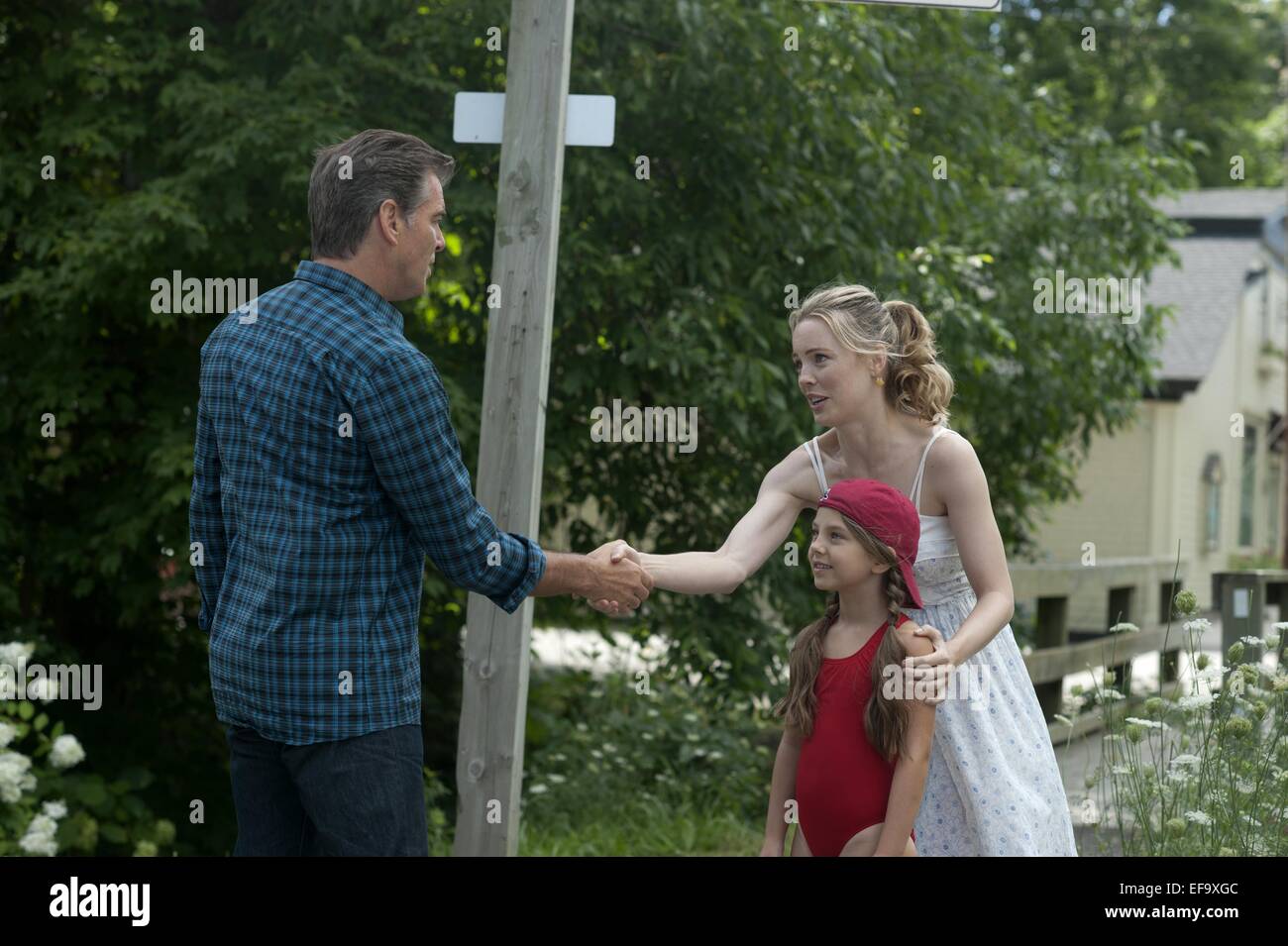 Pierce Brosnan And Caitlin Carmichael High Resolution Stock Photography ...