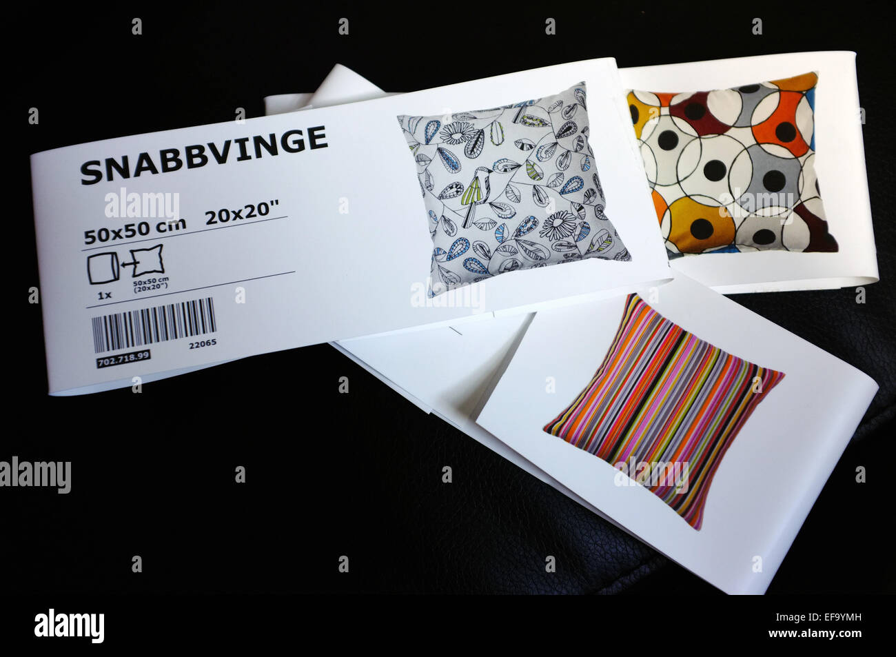 A set of 3 Ikea cushion labels against a dark background Stock Photo ...