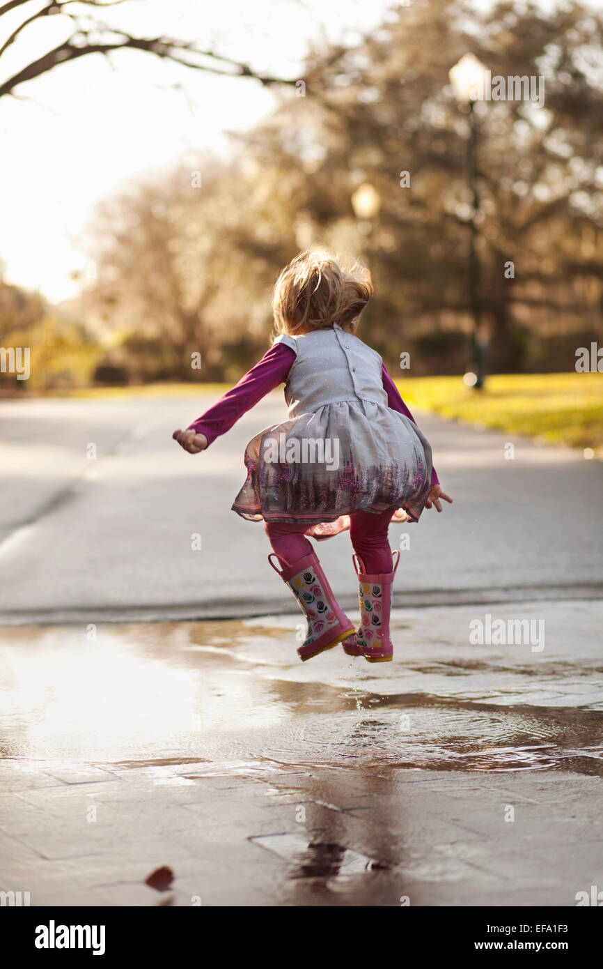 Child puddle splash hi-res stock photography and images - Alamy