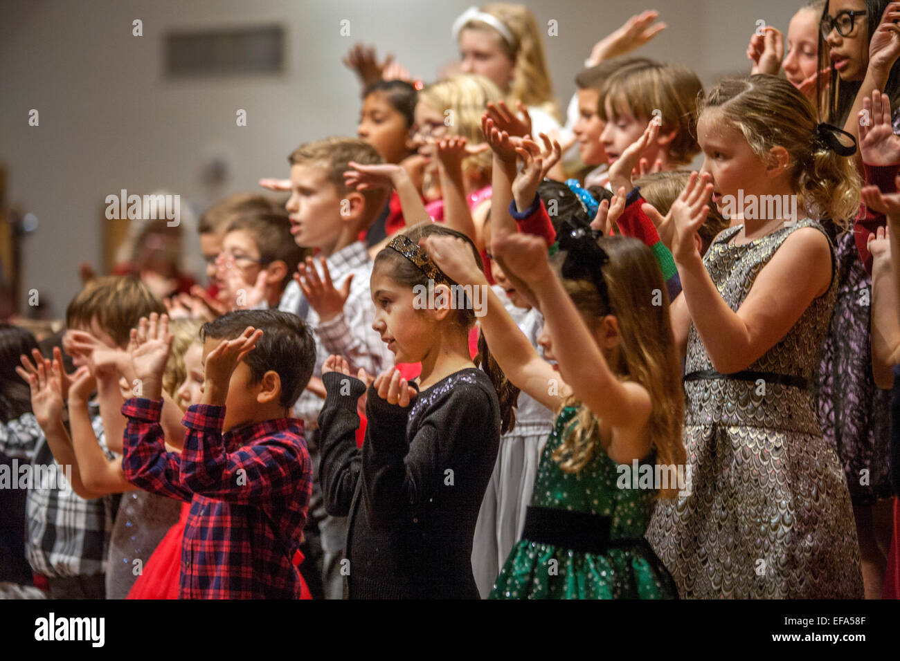 Kids sing mass hi-res stock photography and images - Alamy