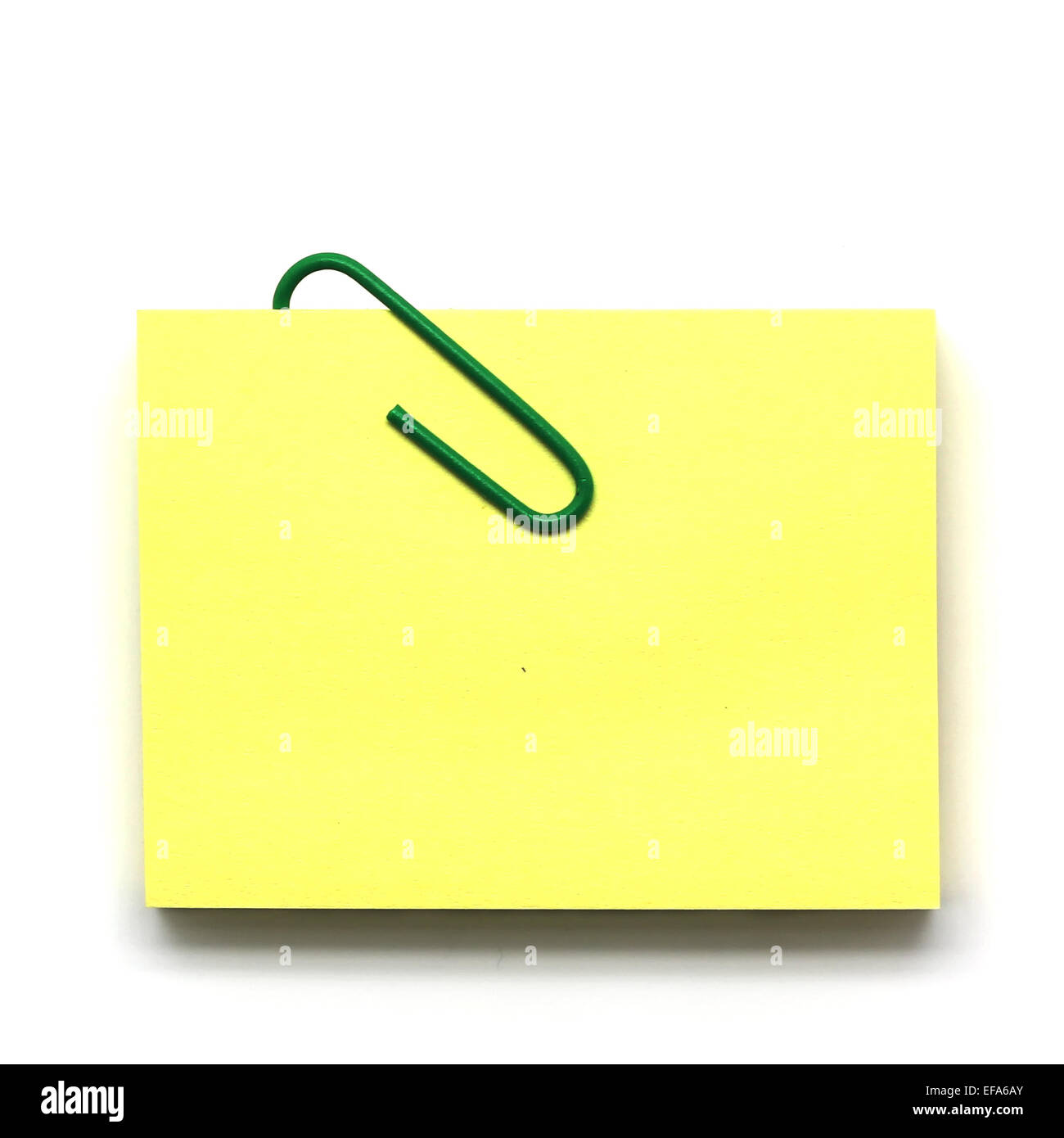 Paper clip and notepad isolated on white background Stock Photo - Alamy
