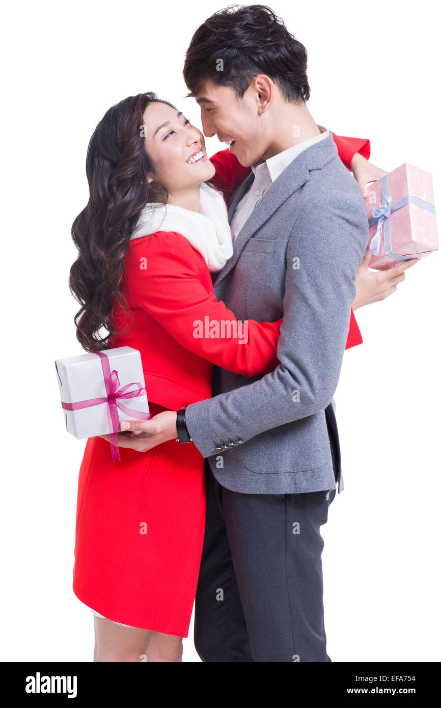 Two women exchanging gift in hi-res stock photography and images - Alamy