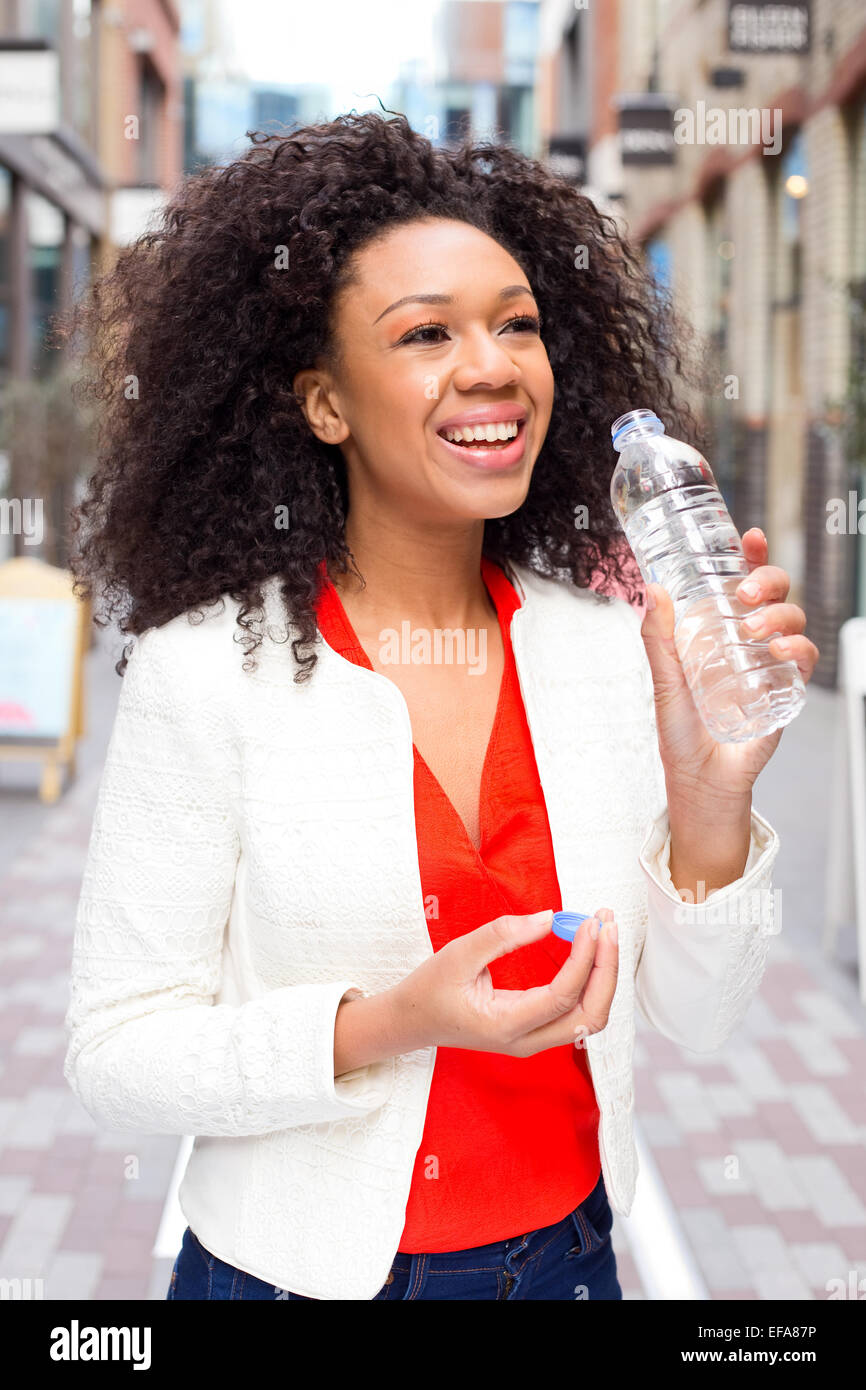 young woman drinking water Stock Photo - Alamy