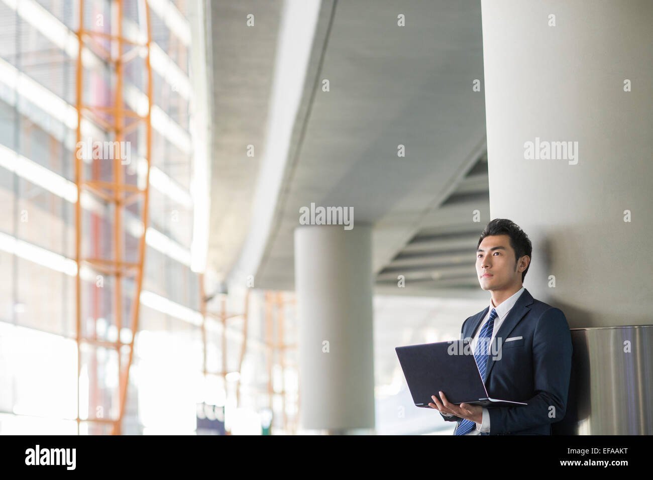 Young businessman using laptop Stock Photo - Alamy Young businessman using laptop Stock Photo - Alamy