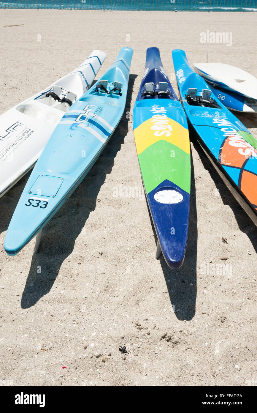 Four surf skis on beach in fan shape. Mount Maunganui, summer beach ...