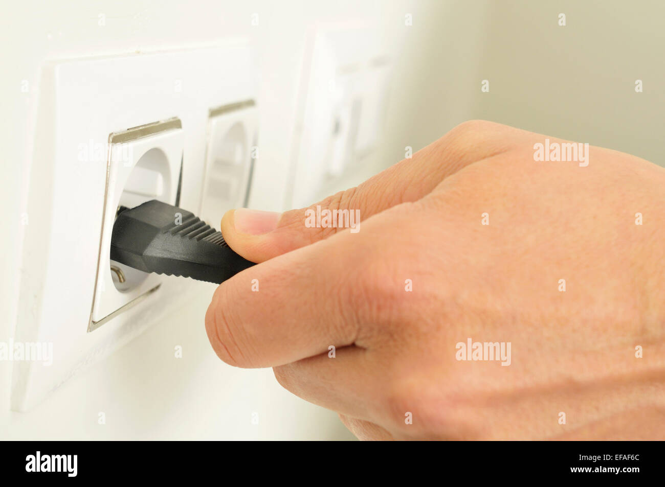 Plugging In A Me Plug High Resolution Stock Photography and Images - Alamy