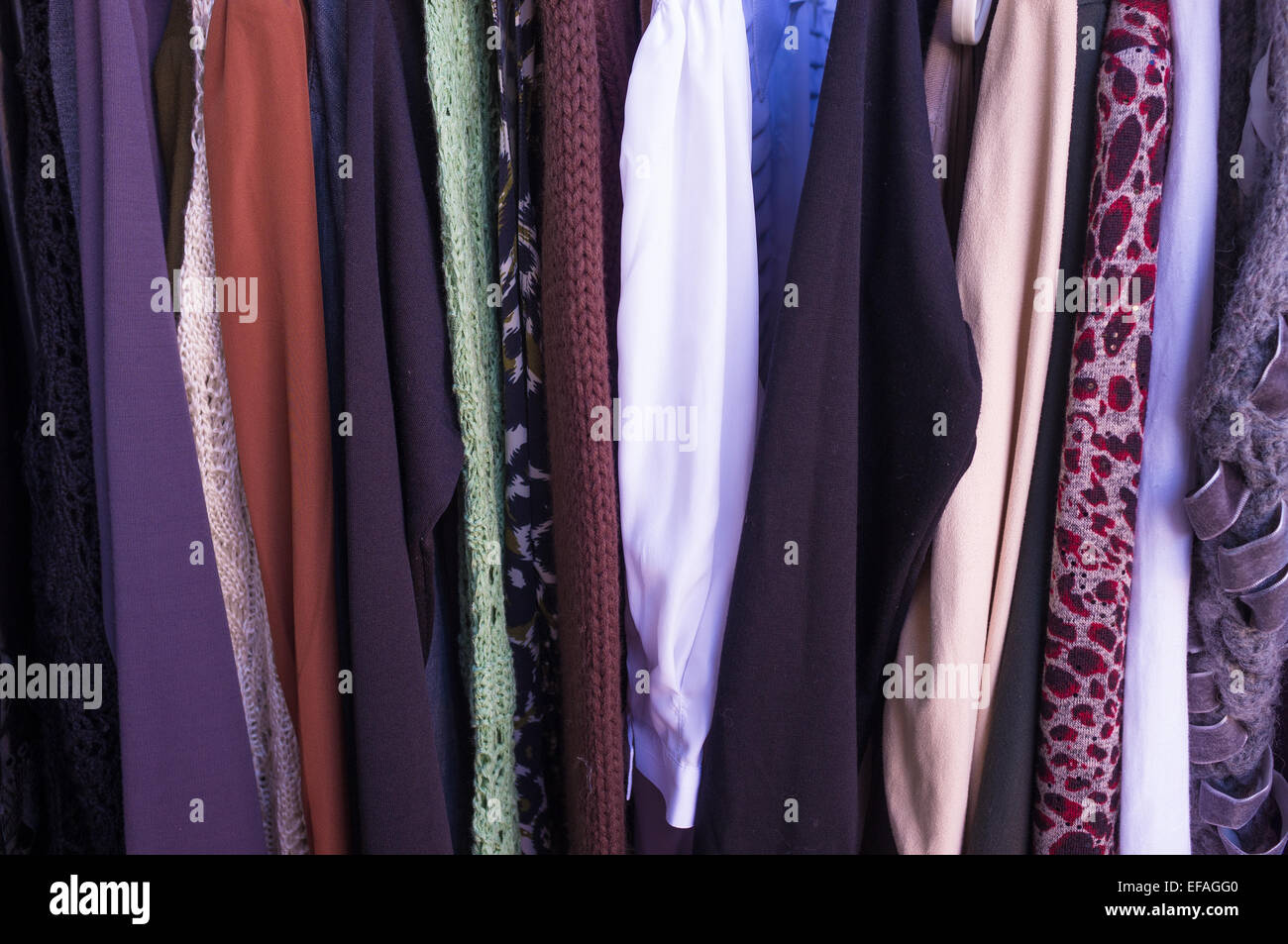 Assorted clothes on a jumble sale stall Stock Photo - Alamy