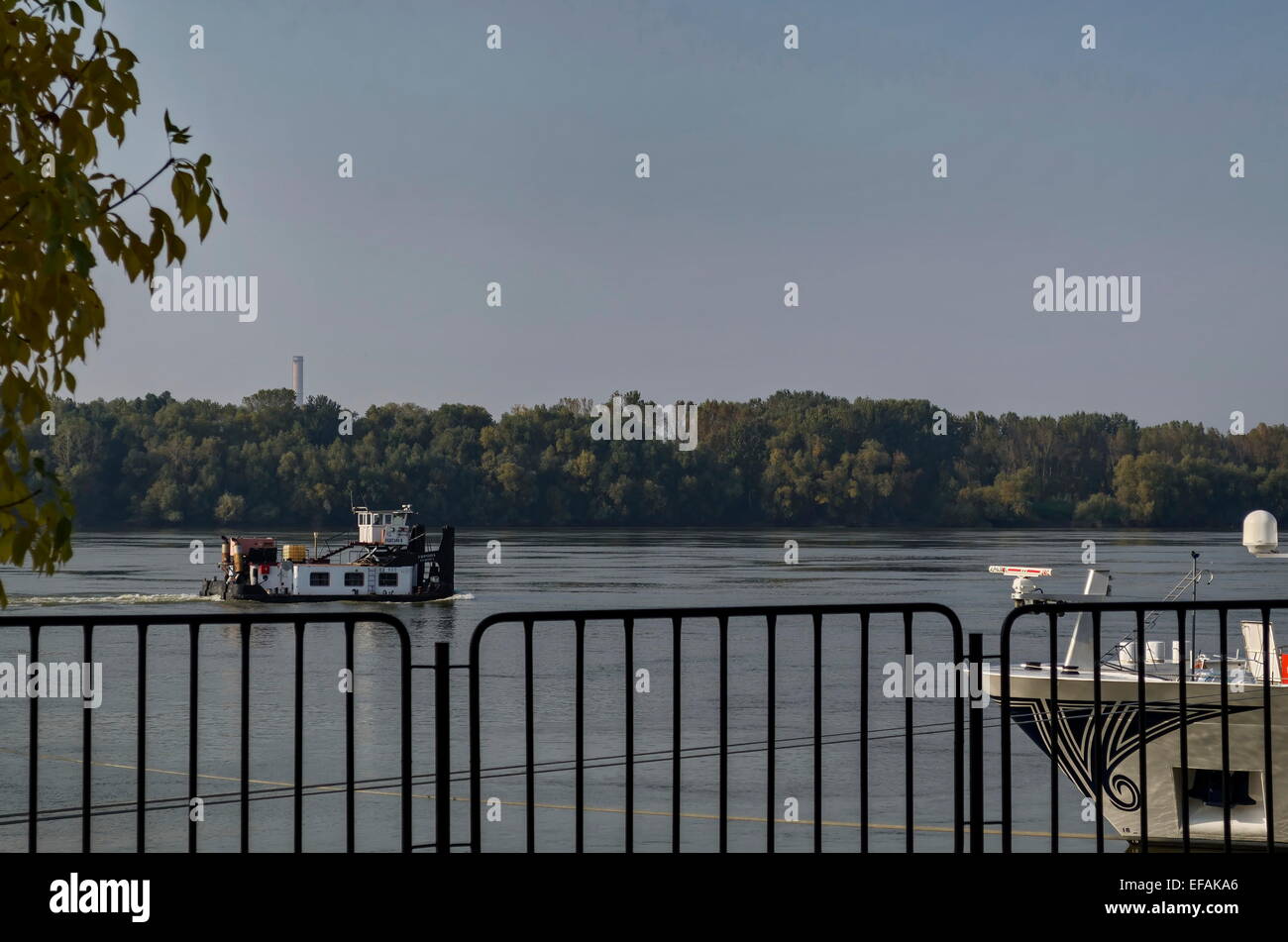 Tugboat pass along the Ruse port at Danube river, Bulgaria Stock Photo ...