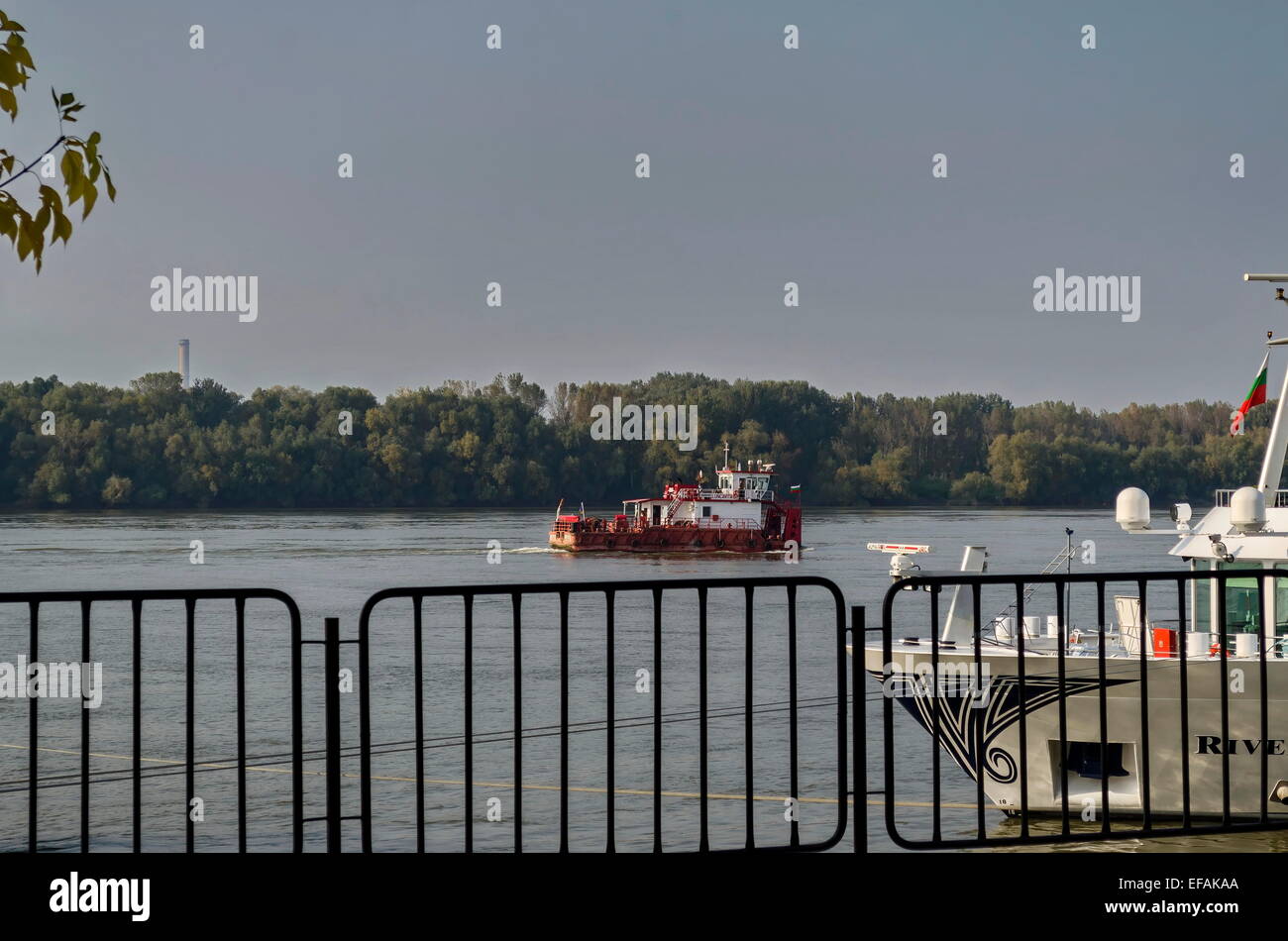 Tugboat pass along the Ruse port at Danube river, Bulgaria Stock Photo ...