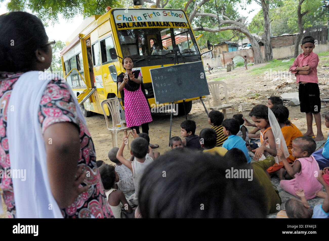 Indian Bus schools project educating poor 'slum' kids in the basics of ...