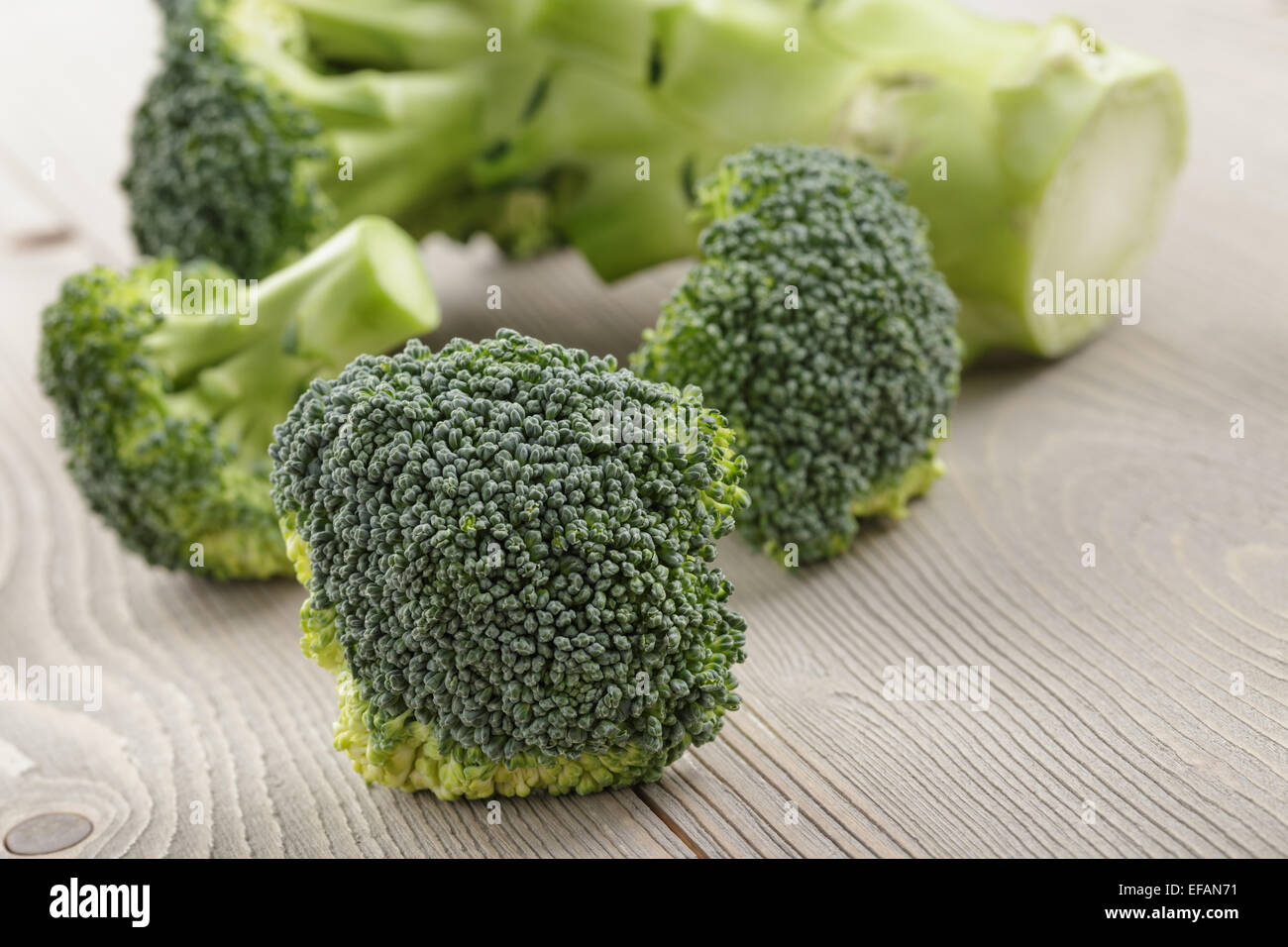 fresh broccoli on wood rustic table Stock Photo - Alamy