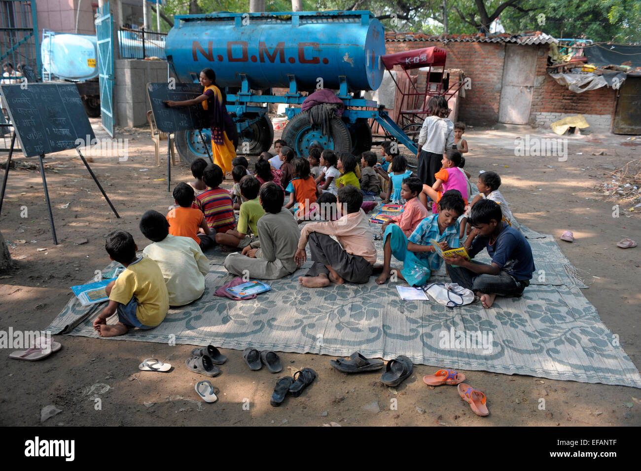 bus schools visit slum areas of delhi india to provide kids with ...