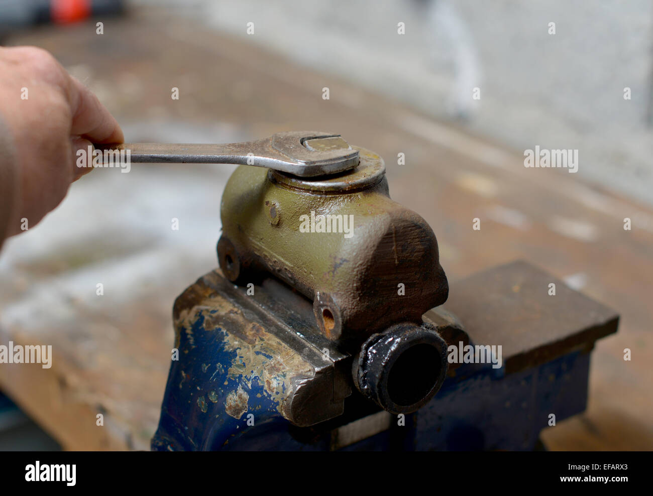 dismantling of a master cylinder dand a mechanical workshop Stock Photo ...
