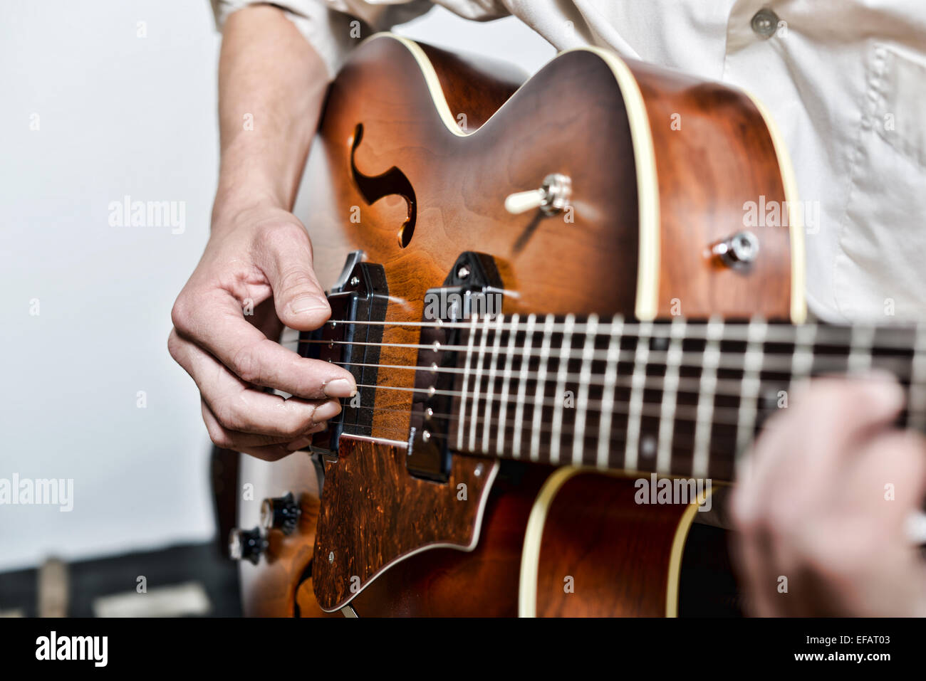 close-up on the fingers of the guitarist Stock Photo - Alamy