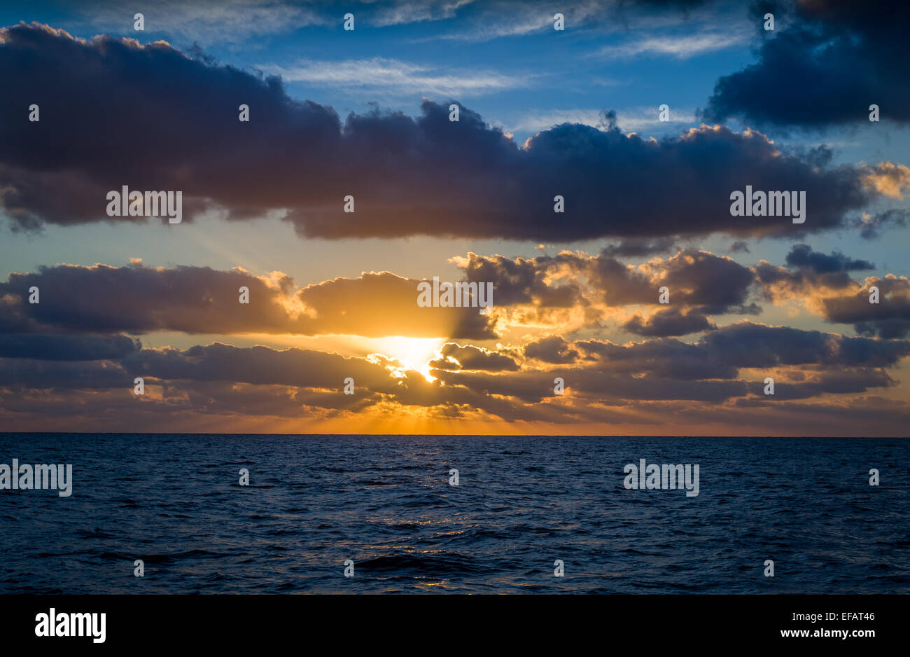 Sunrise at ocean Stock Photo - Alamy