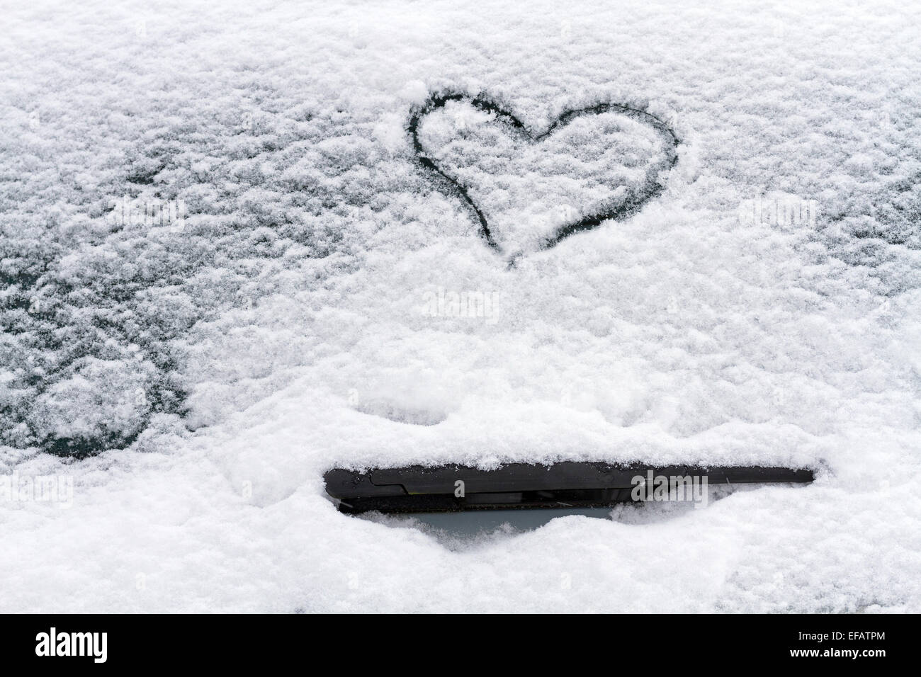 Heart symbol on a car windshield Stock Photo - Alamy
