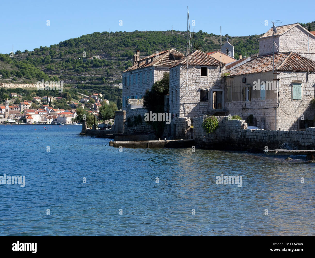 Old stone houses on island Vis port near the blue sea Stock Photo - Alamy