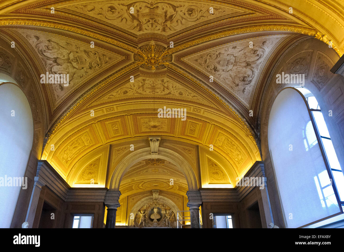 The beautiful golden design of the ceiling along the corridor of the ...