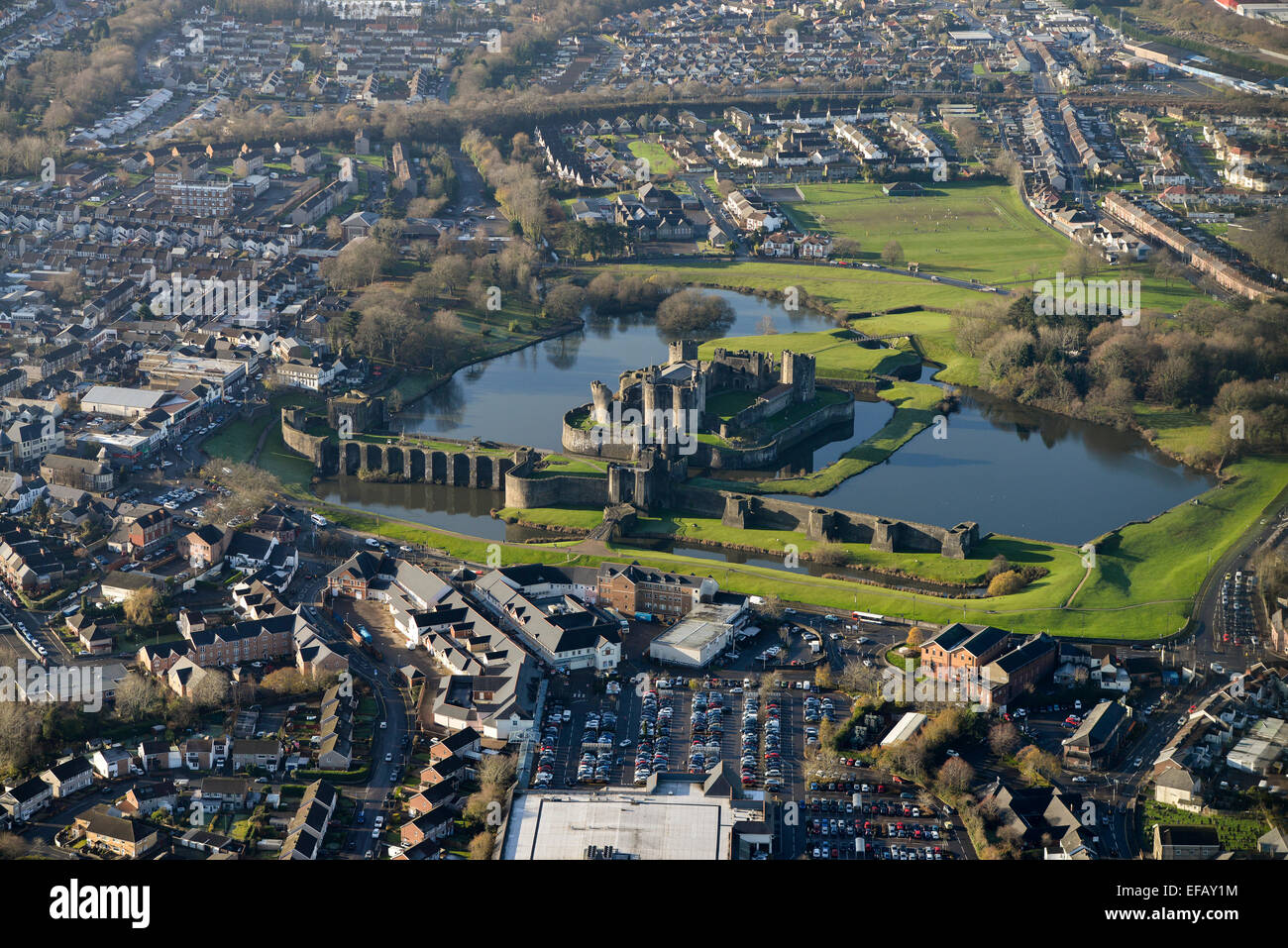 An aerial view of Caerphilly Castle, a partially ruined fortification ...