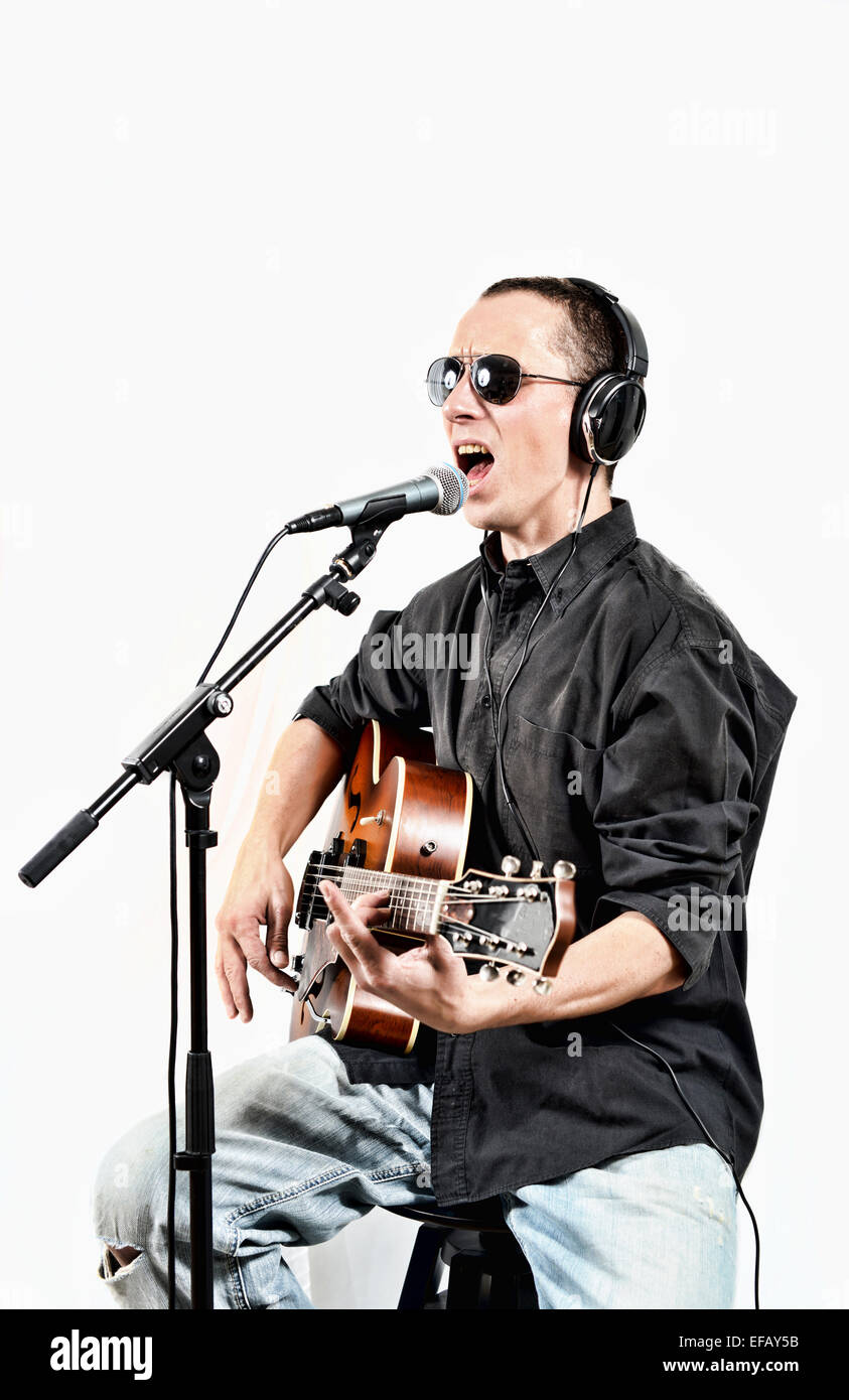 Singer guitar sitting on chair hi-res stock photography and images - Alamy