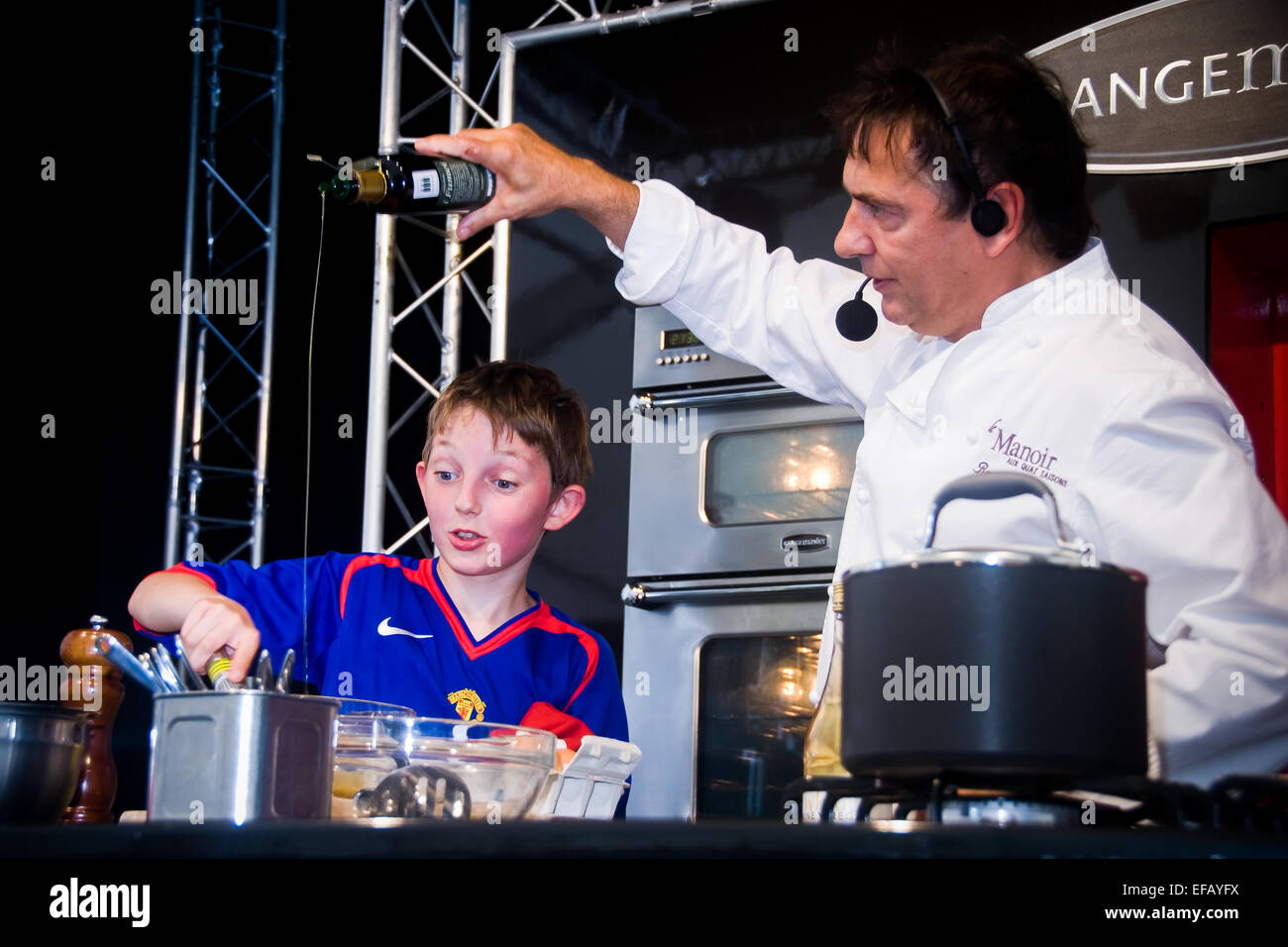 Raymond Blanc, TV chef doing a cooking demonstration with 10 year old ...