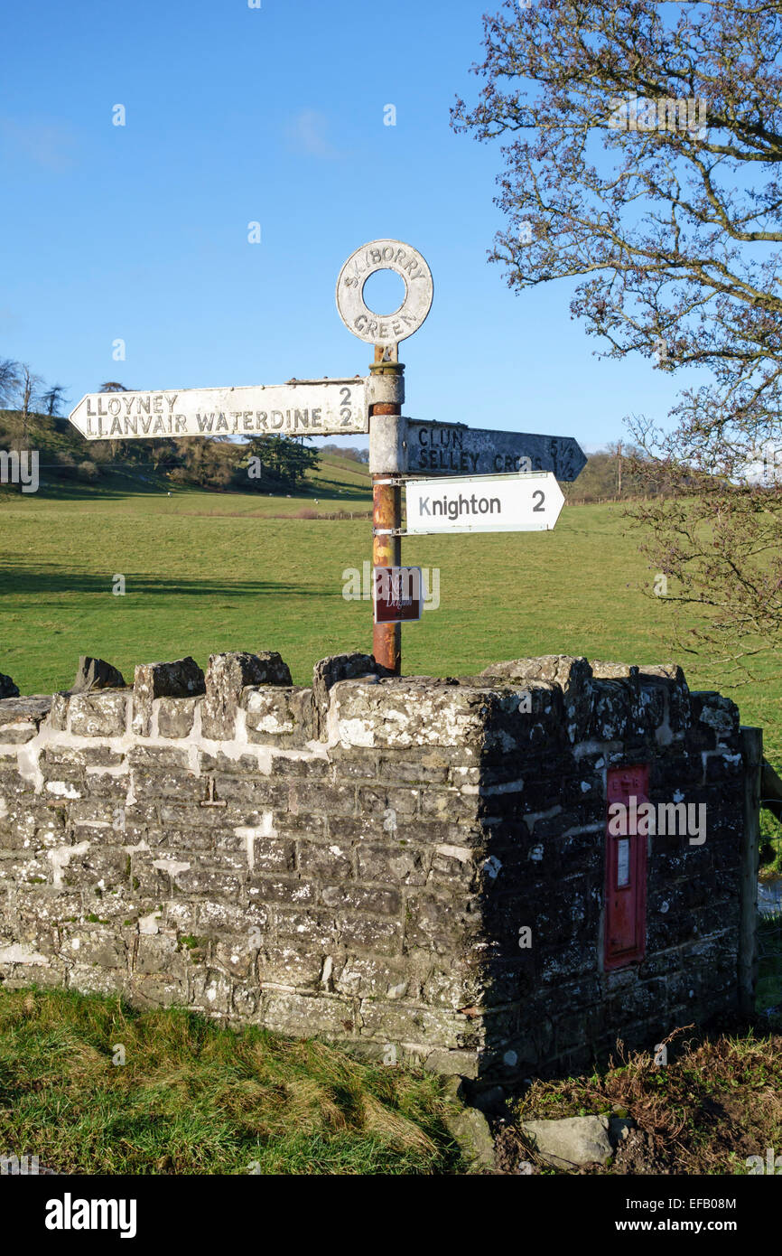 An old signpost on a country lane in the Teme valley near Knighton ...