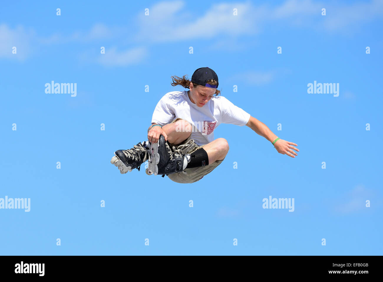 BARCELONA - JUN 28: A professional skater at the Inline skating jumps ...