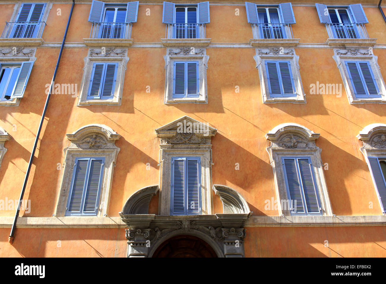 Shadows and shutters. Apartment block, Rome, Italy Stock Photo - Alamy
