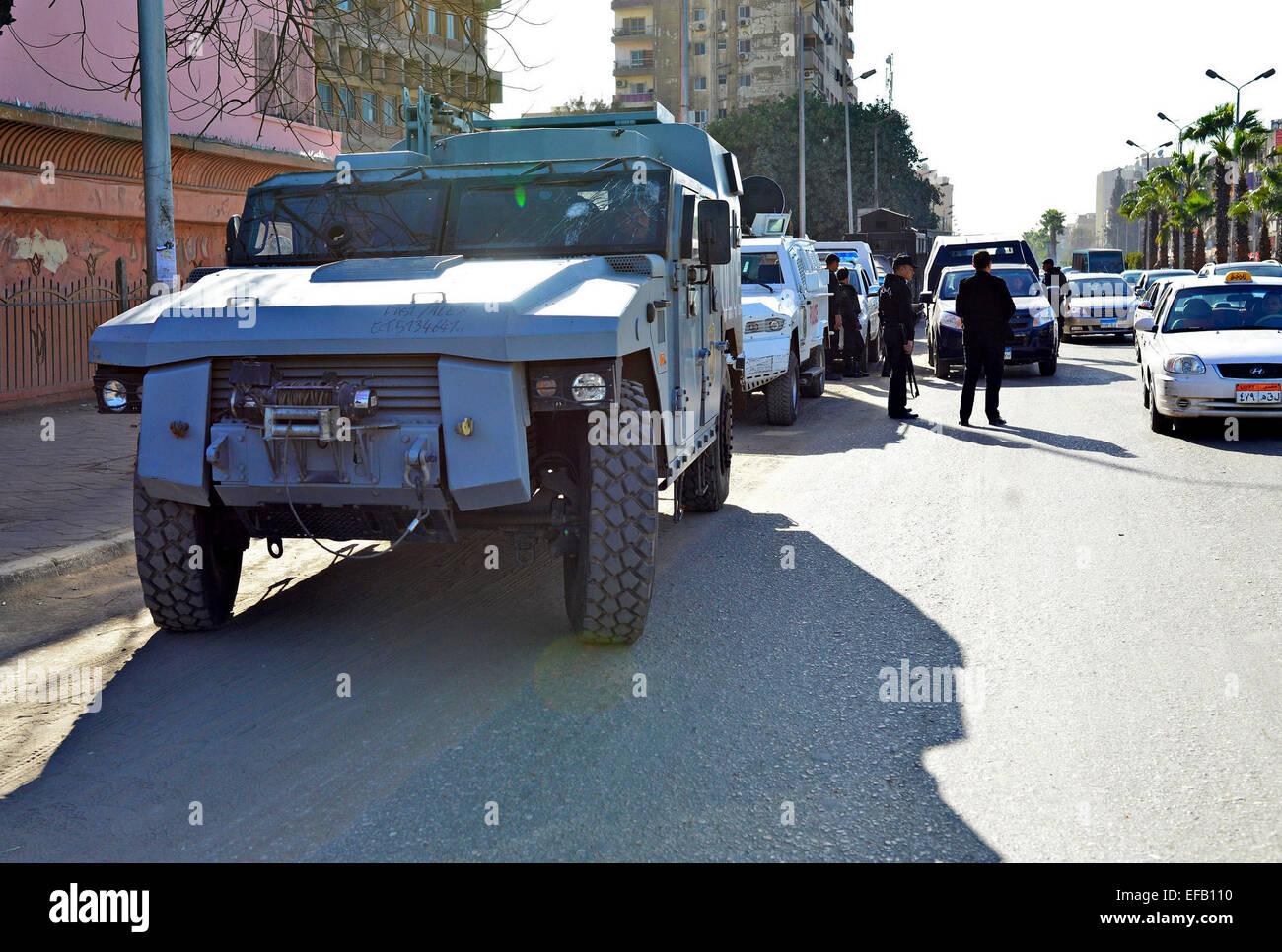 Cairo, Egypt. 30th Jan, 2015. Egyptian security forces sit on a ...