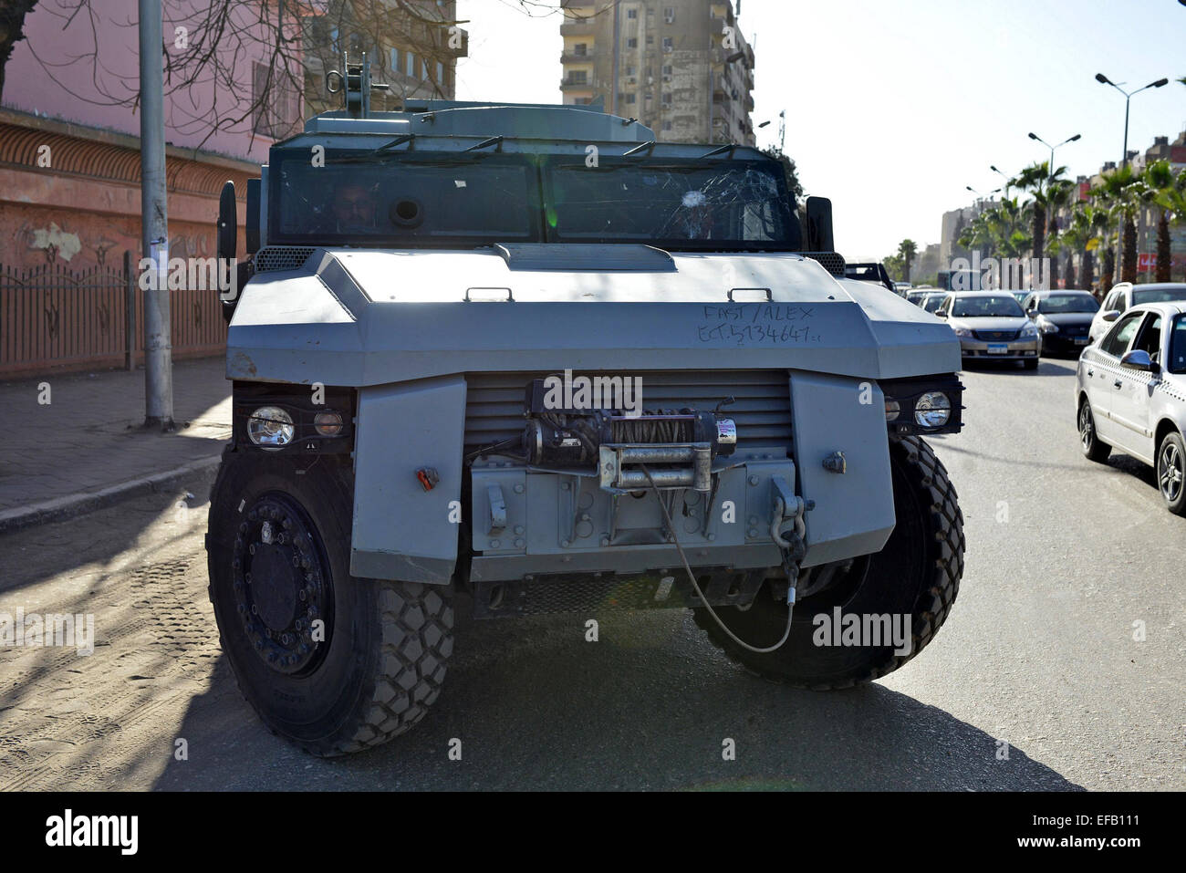 Cairo, Egypt. 30th Jan, 2015. Egyptian security forces sit on a ...