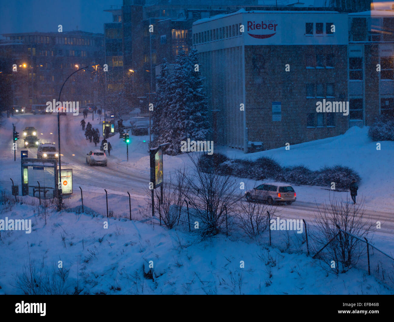 Blue hour, early winter morning in Brynseng Oslo Norway, snowing, road ...
