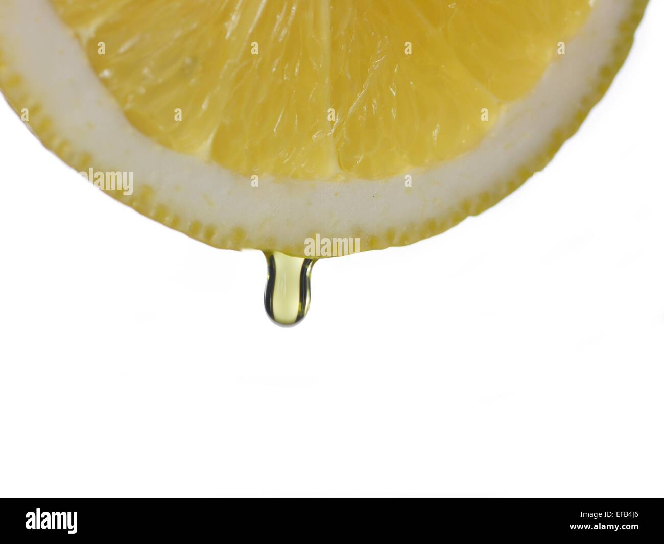 yellow lemon with drop on white background Stock Photo - Alamy