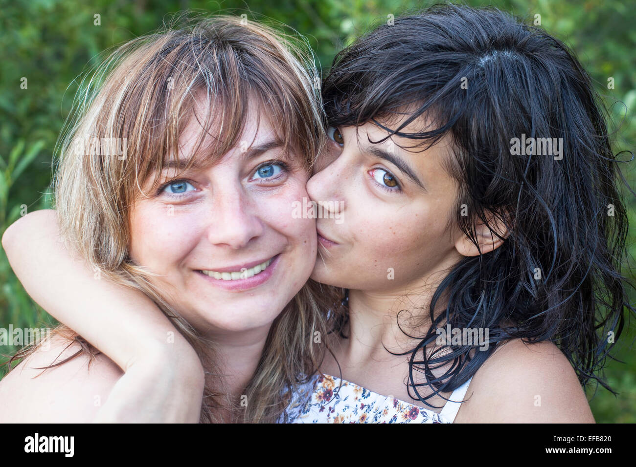Mother and daughter teenager hugging hi-res stock photography and ...