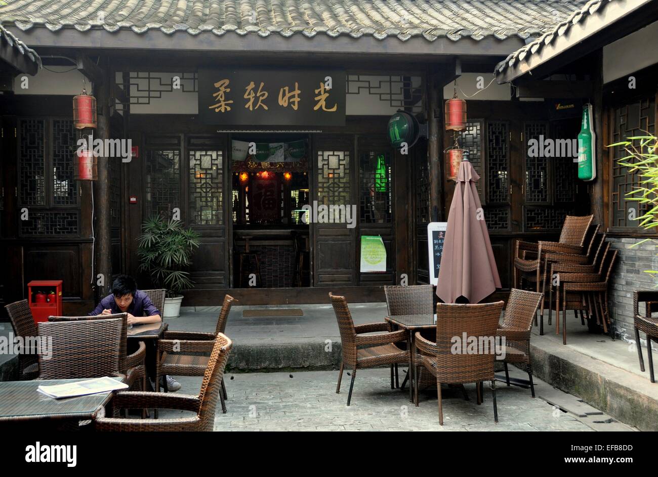 Chengdu, China: Courtyard of a small restaurant with outdoor tables on ...
