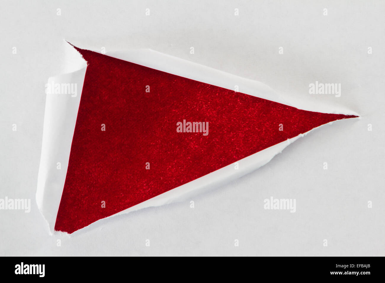 ripped paper background opening to a velvet red texture Stock Photo - Alamy
