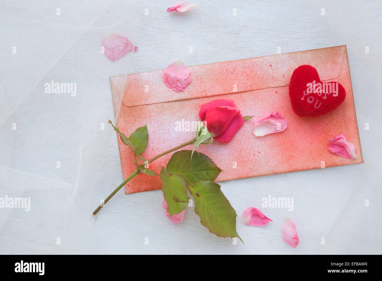 Valentines background: rose,plush heart, envelope,rose petals Stock ...