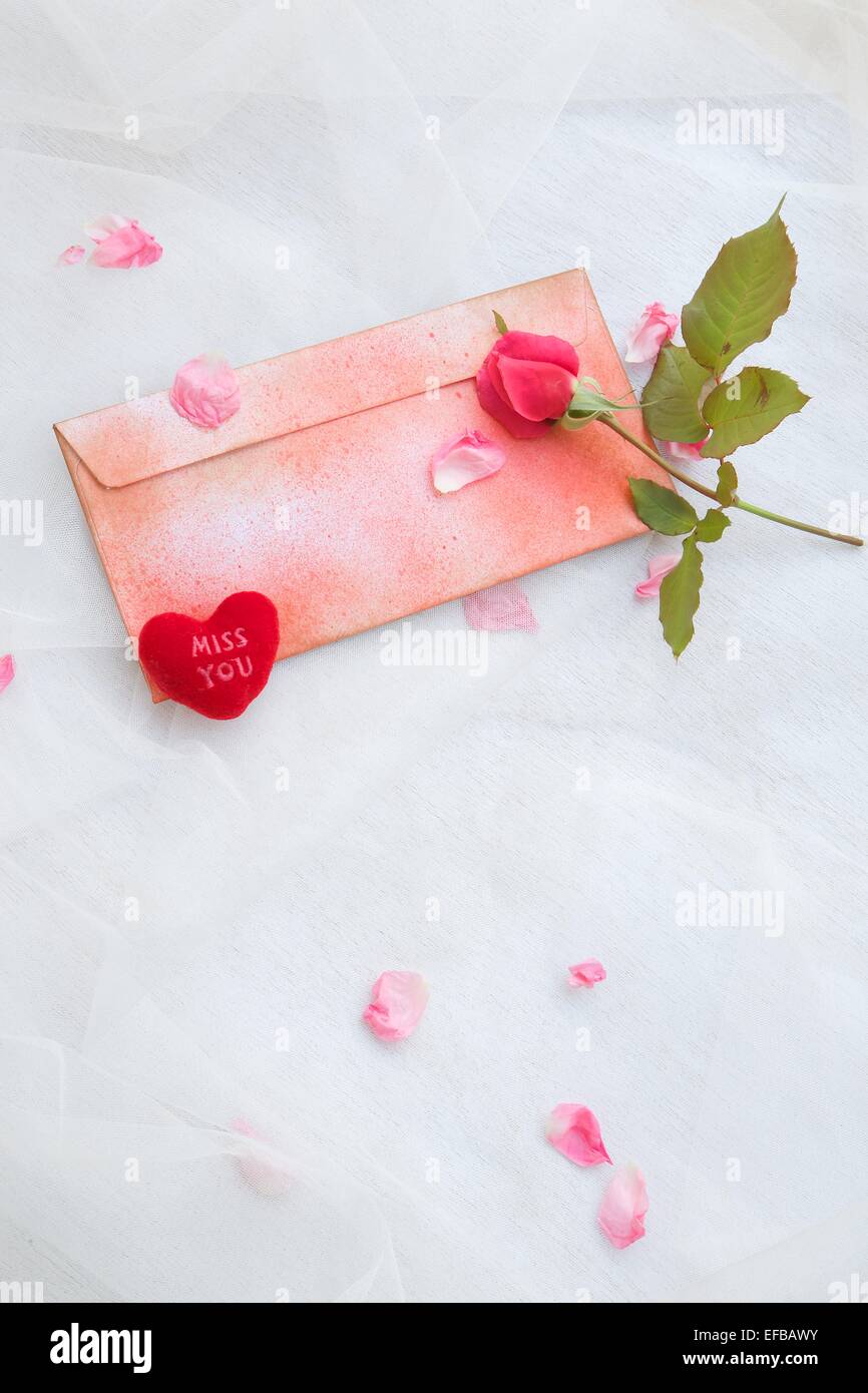 Valentines background: rose,plush heart, envelope,rose petals Stock ...