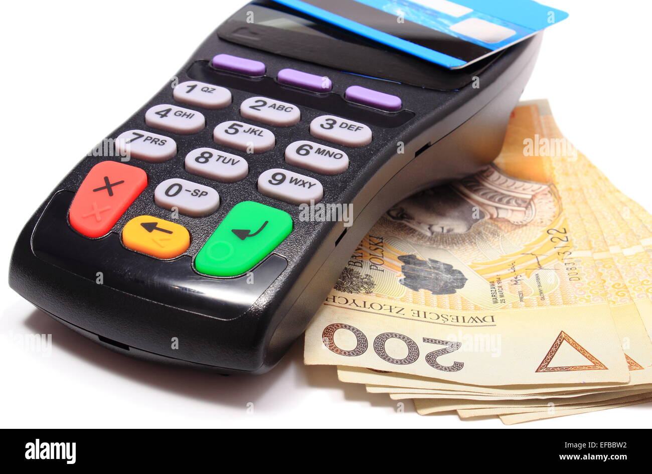 Payment terminal with contactless credit card and money on white ...
