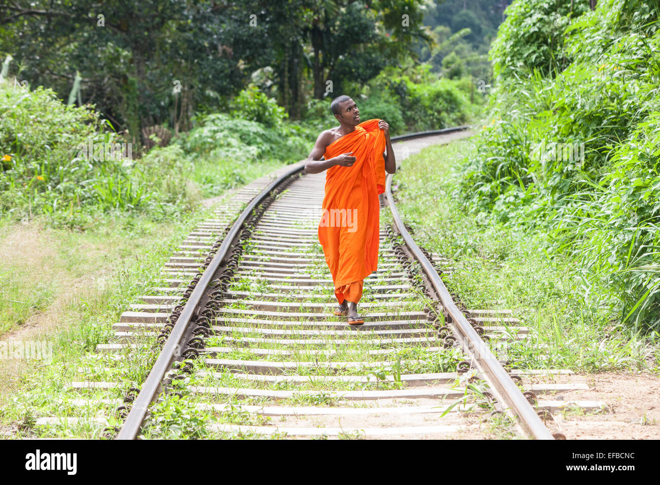 At town of Ella in Highlands of Sri Lanka.Local, Buddhist monk, walking ...