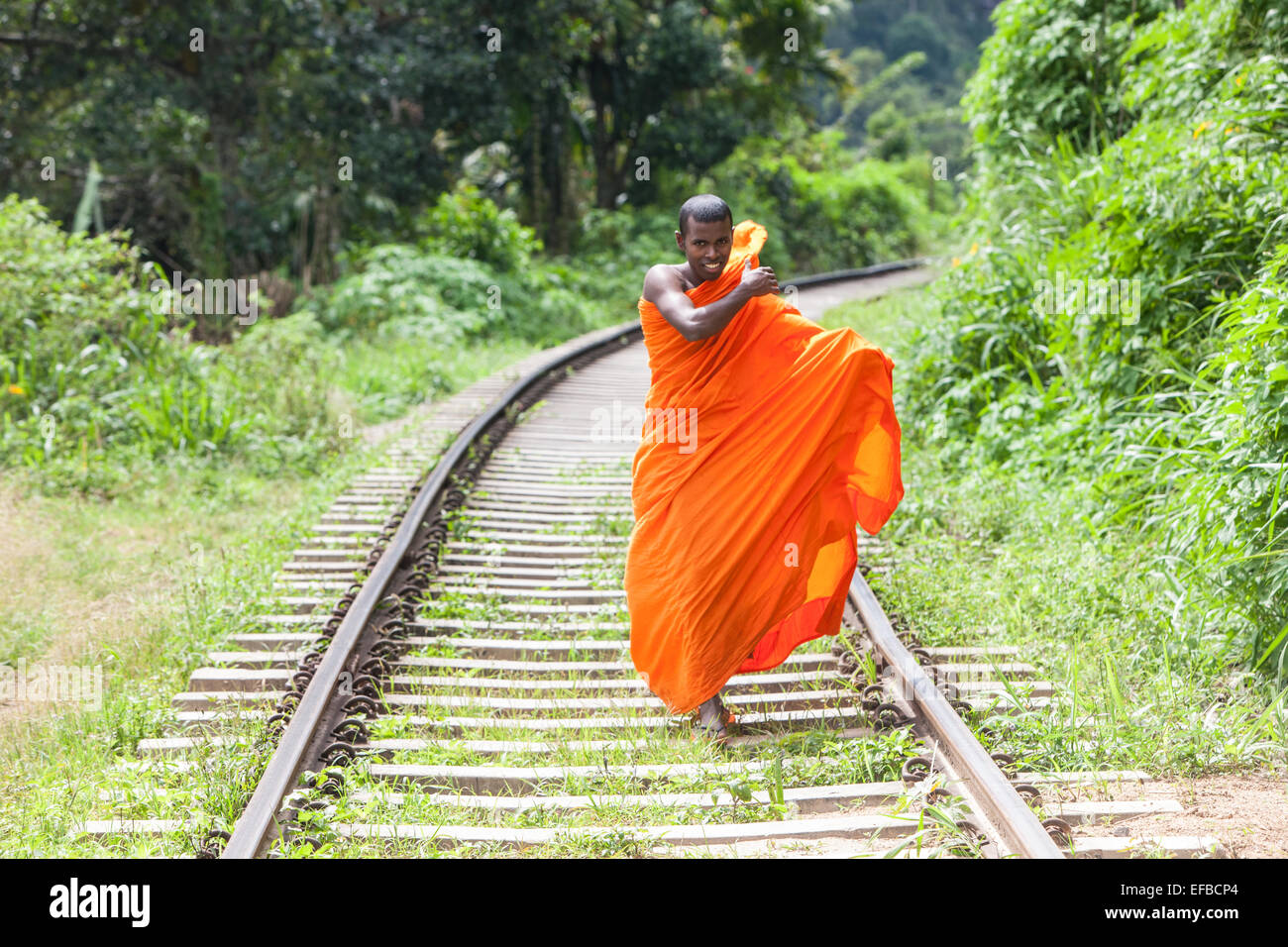 At town of Ella in Highlands of Sri Lanka.Local, Buddhist monk, walking ...