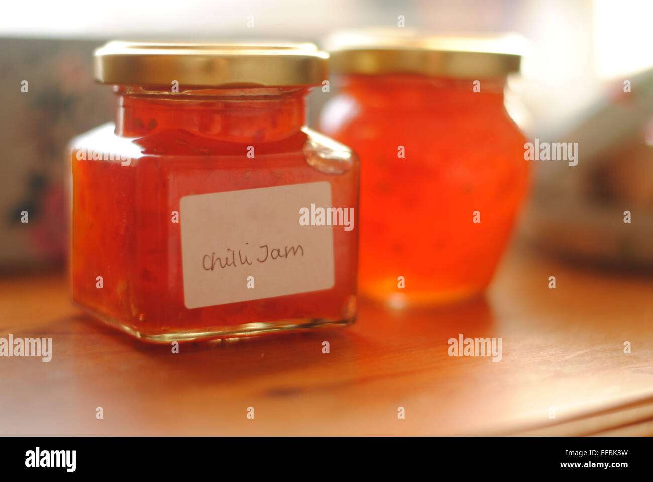 Two jars of homemade chilli jam Stock Photo - Alamy