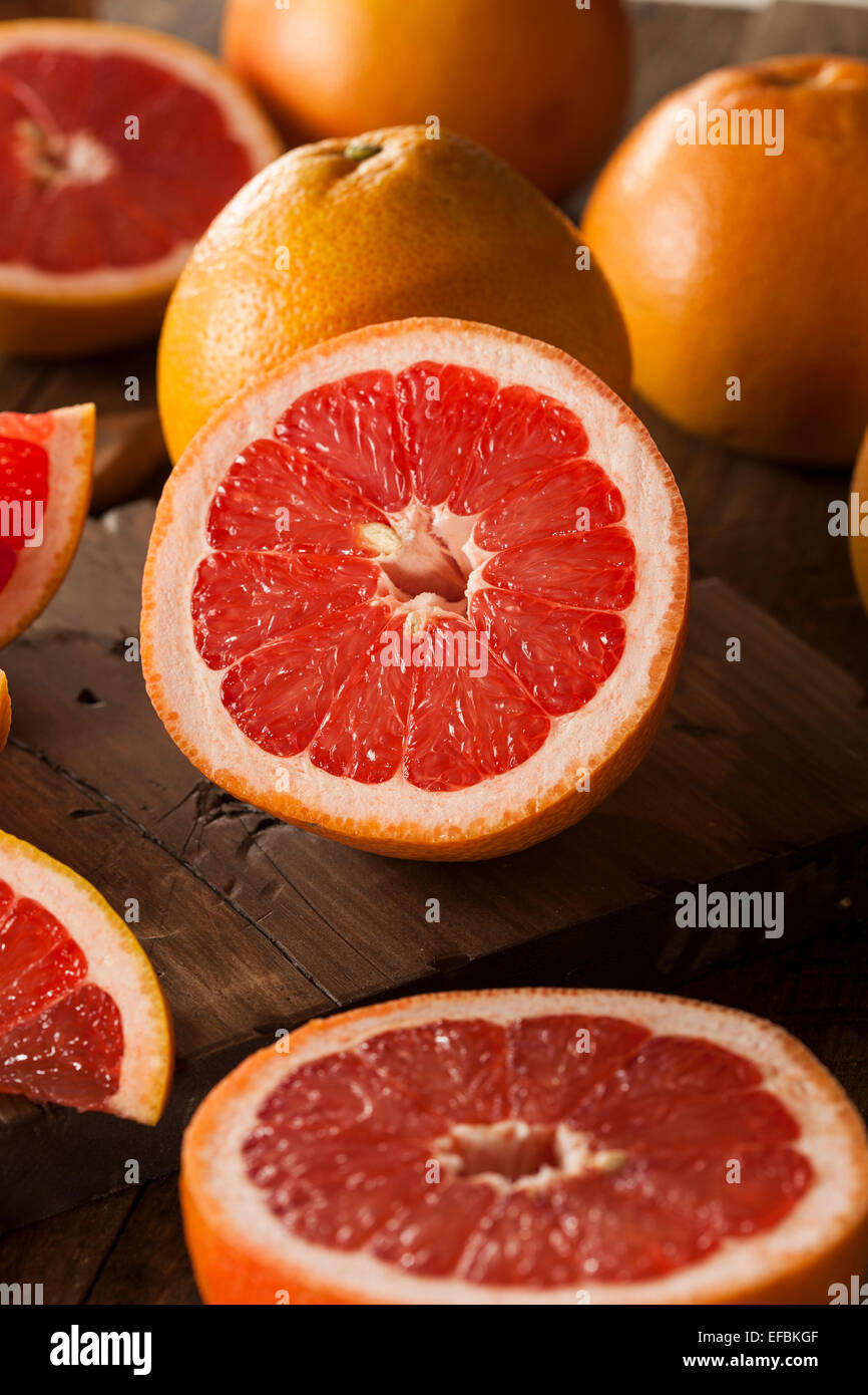 Healthy Organic Red Ruby Grapefruit on a Background Stock Photo - Alamy