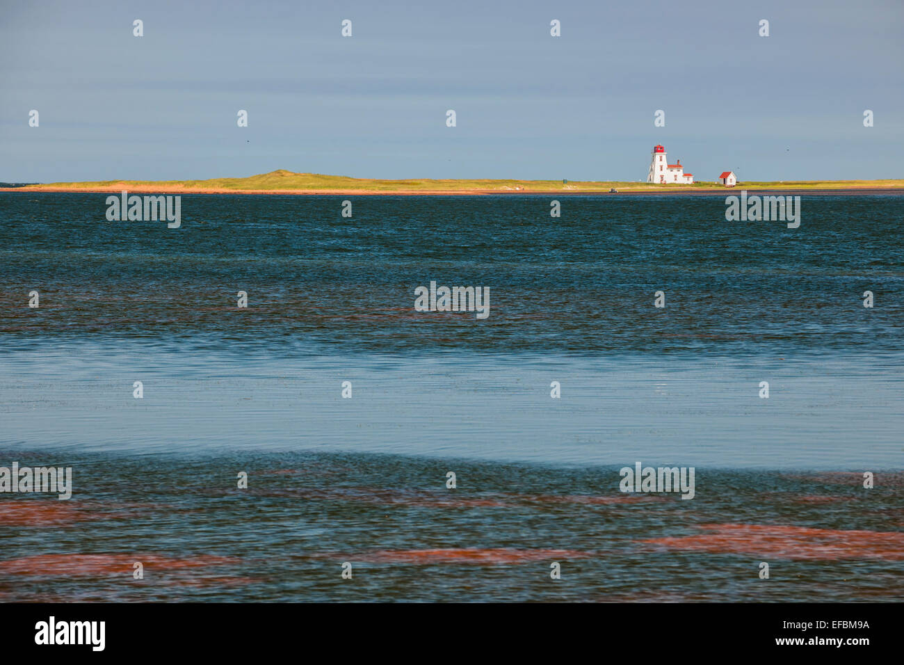 Atlantic ocean landscape with Cascumpec Sandhill lighthouse in Prince ...