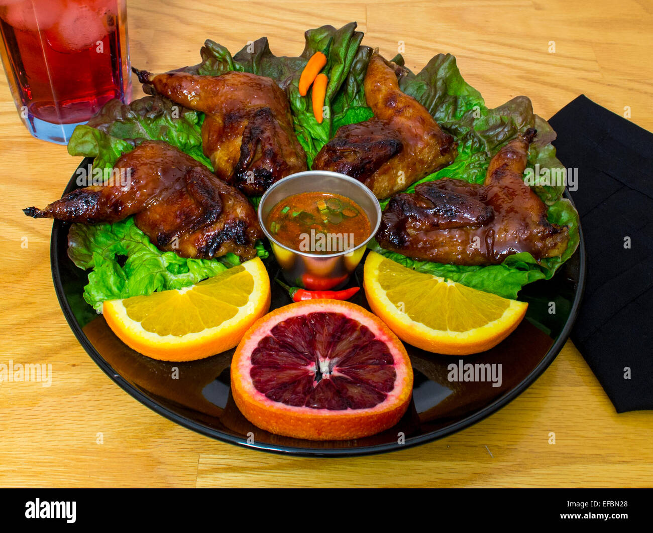 Glazed Quail, Cambodian Asian food Stock Photo - Alamy