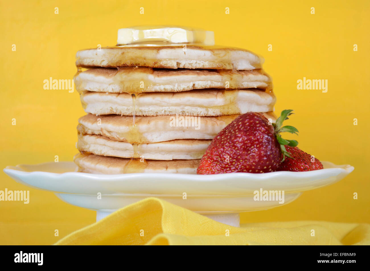 Shrove Pancake Tuesday stack of pancakes with honey and butter on ...