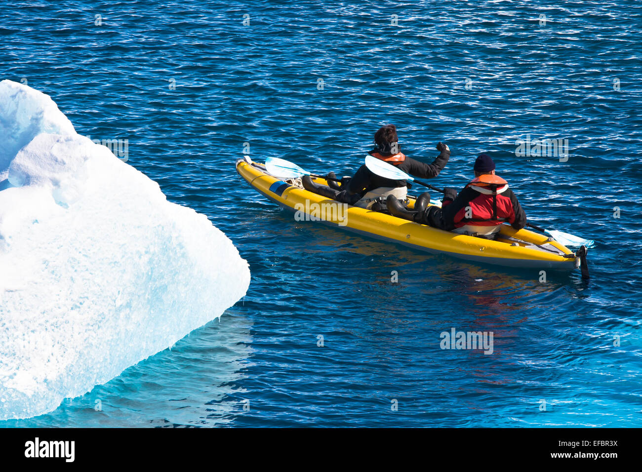 Two men in a canoe Stock Photo - Alamy
