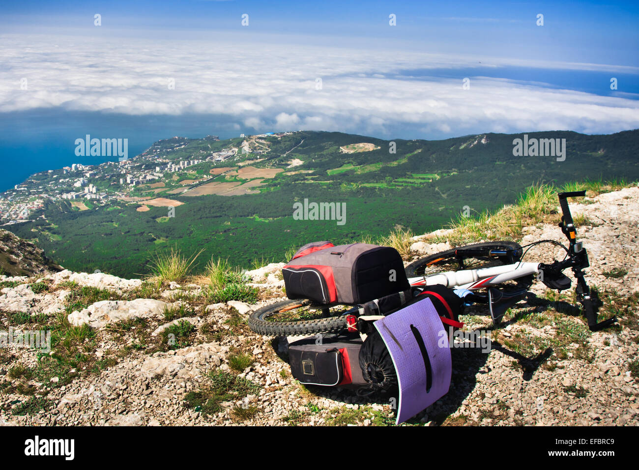 Bike over the precipice Stock Photo - Alamy